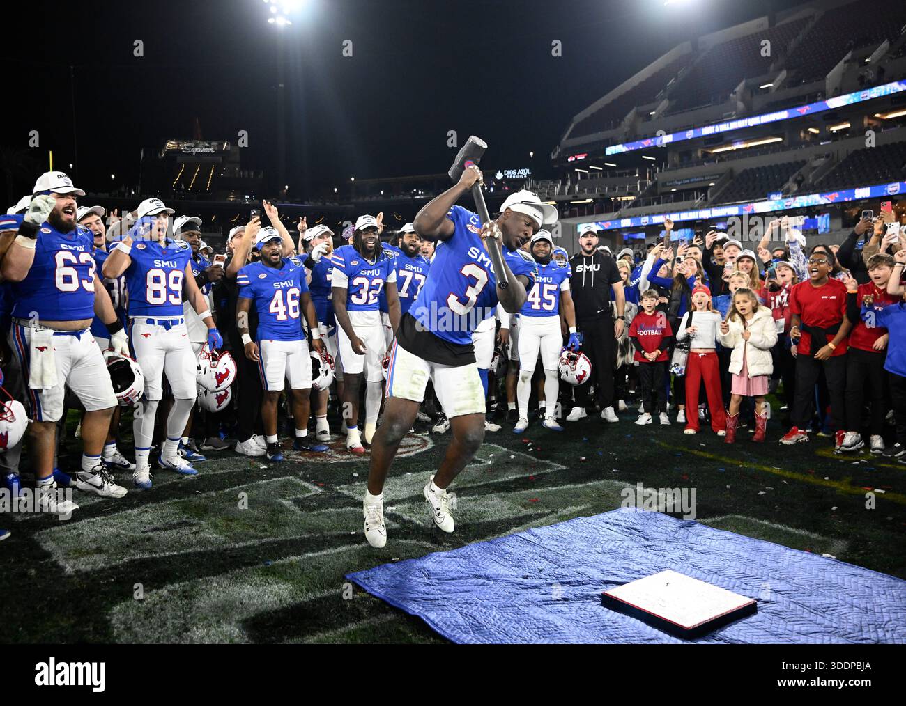 SMU safety Ahmaad Moses (3) breaks a brick with the Arizona logo on it ...