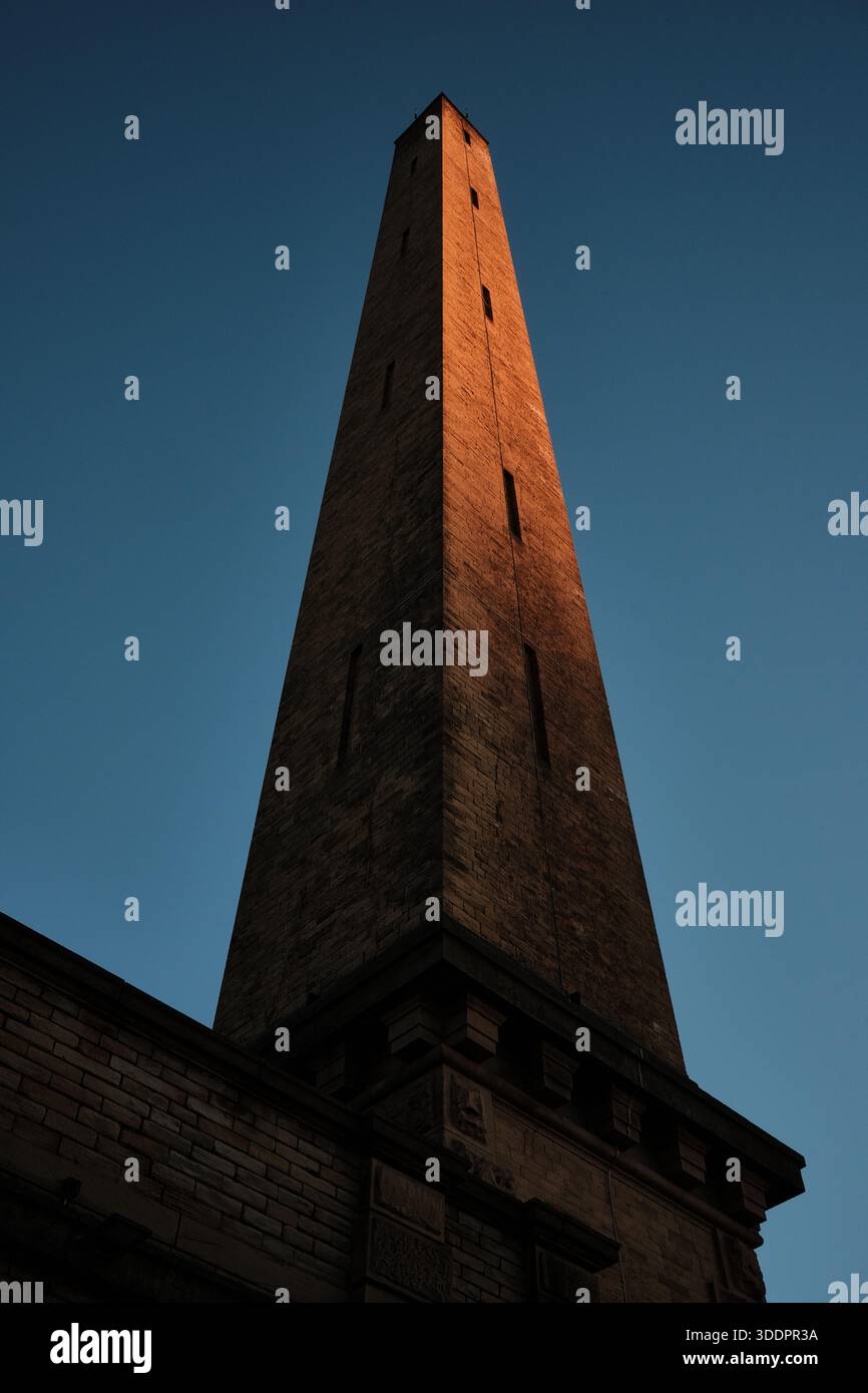 Morning Sun on the top of Salts Mill chimney stack in Saltaire Village ...