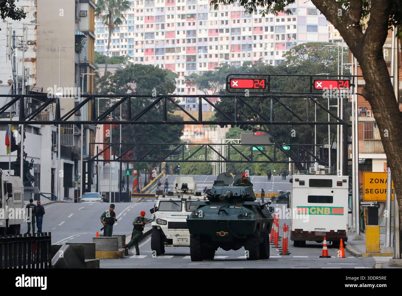 National Guard armored vehicles block an avenue leading to Miraflores ...