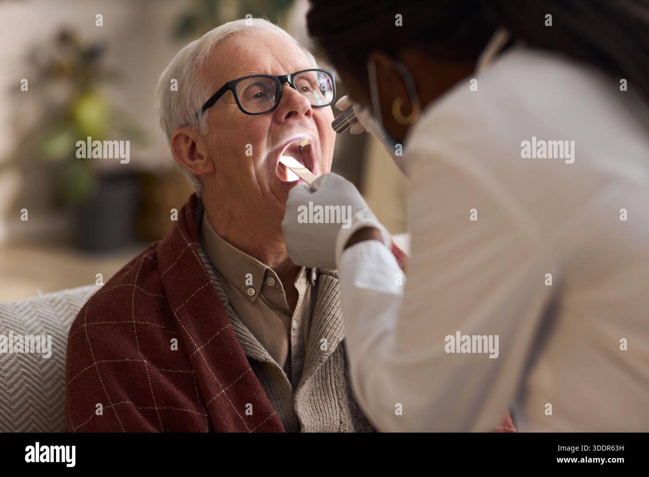 Female doctor using stethoscope tongue hi-res stock photography and ...