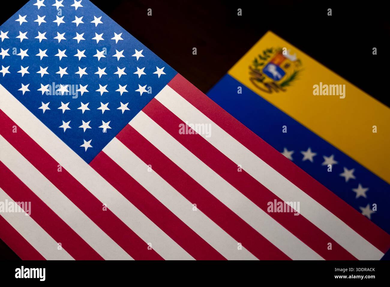 In this photo illustration, the American flag and the Venezuelan flag ...