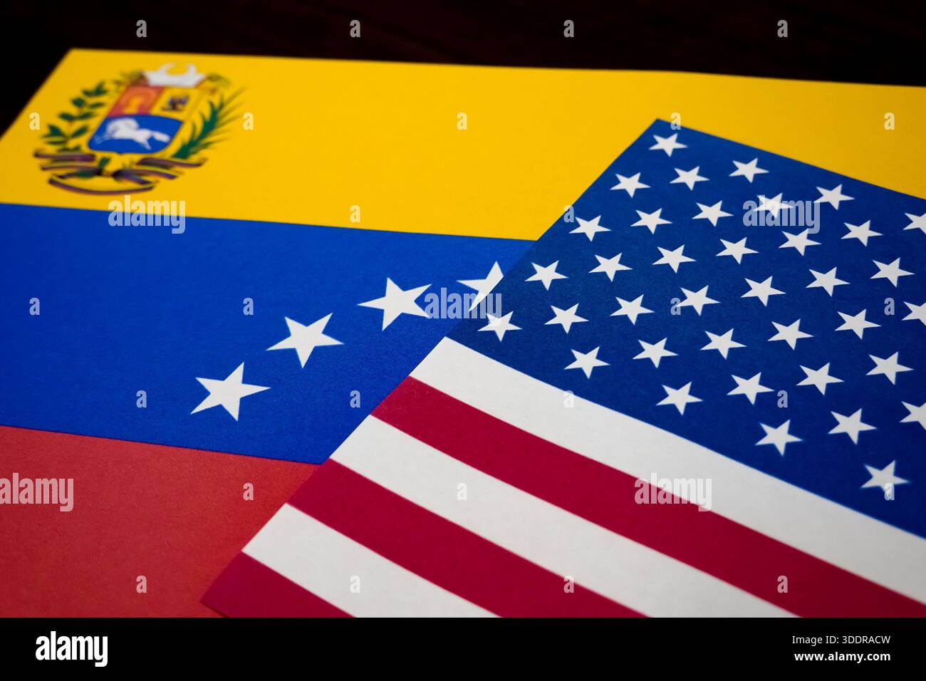 In this photo illustration, the American flag and the Venezuelan flag ...