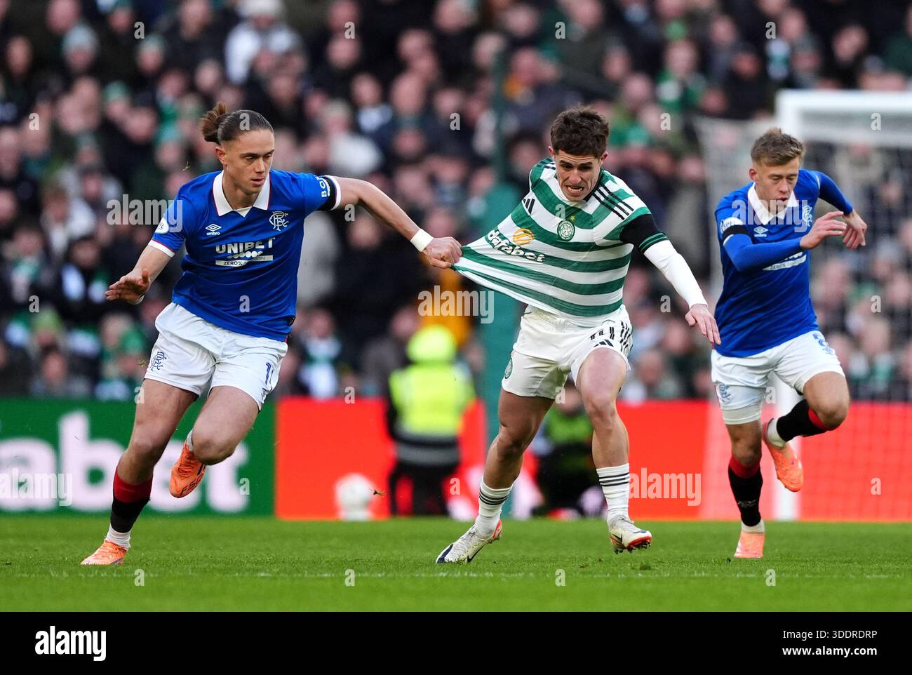 Rangers' Thelo Aasgaard pulls back on Celtic's Luke McCowan during the ...