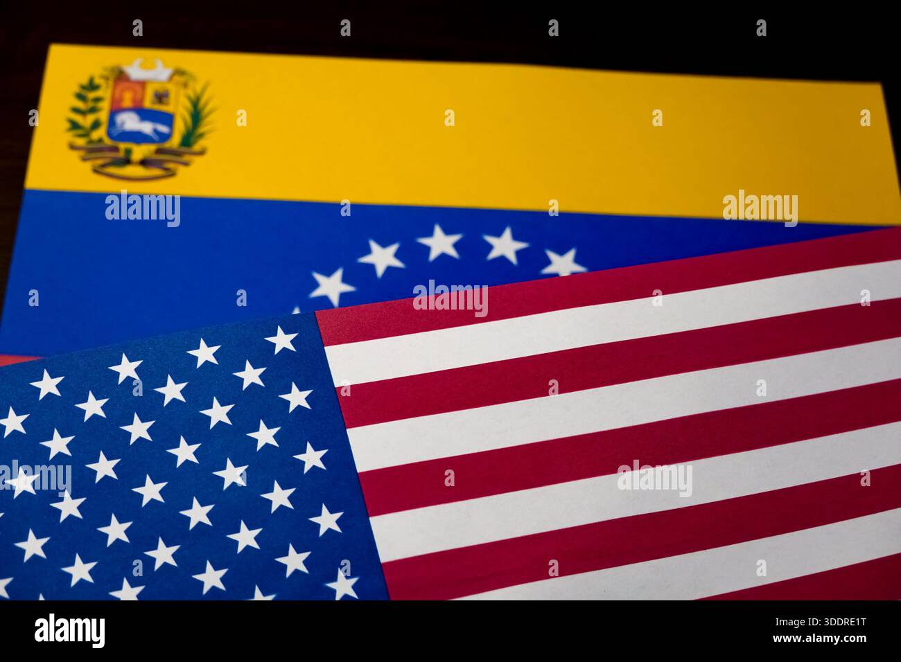 In this photo illustration, the American flag and the Venezuelan flag ...