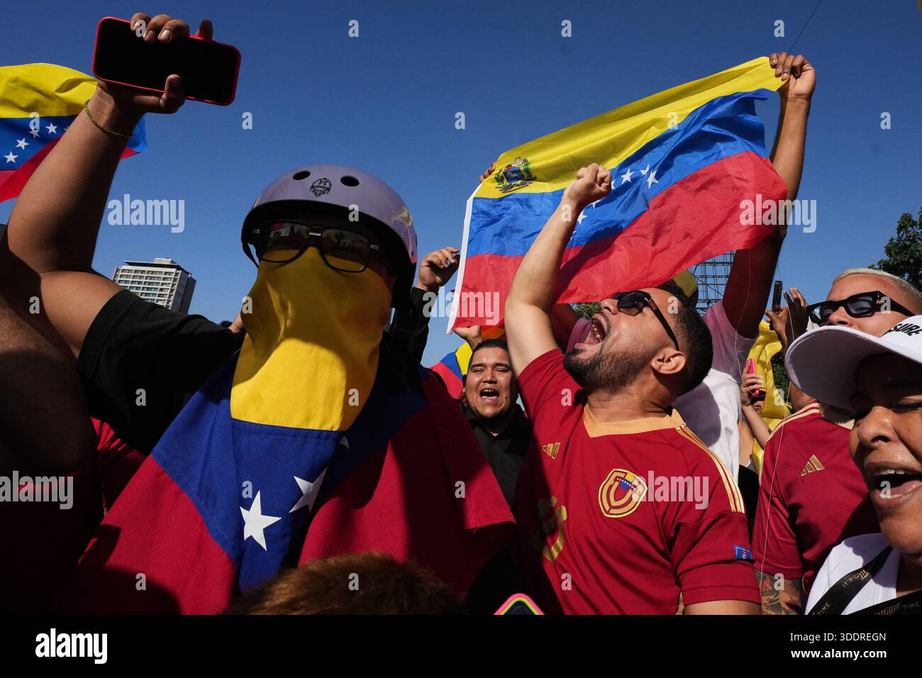 Venezuelans celebrate after U.S. President Donald Trump announced that ...