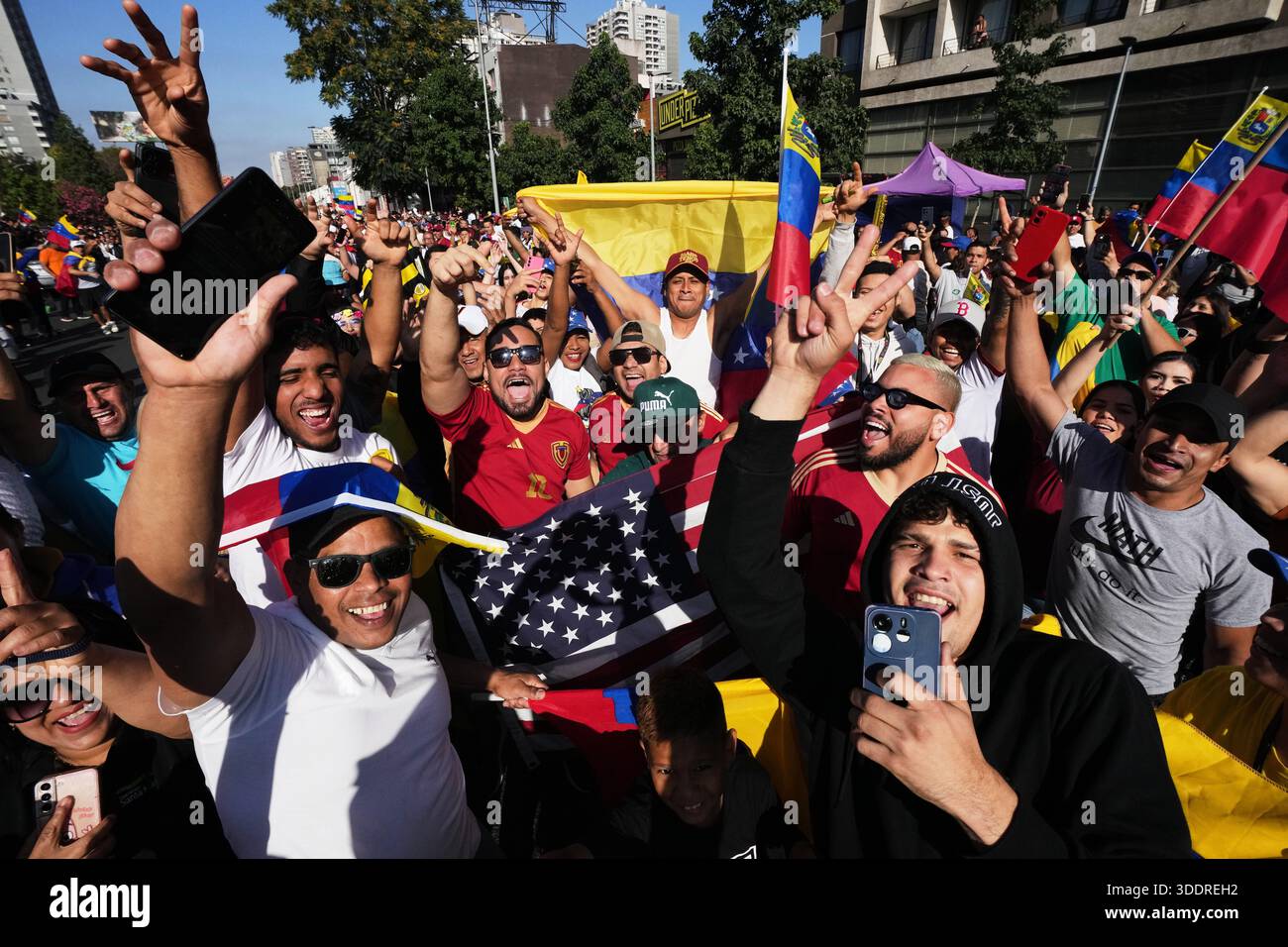 Venezuelans celebrate after U.S. President Donald Trump announced that ...