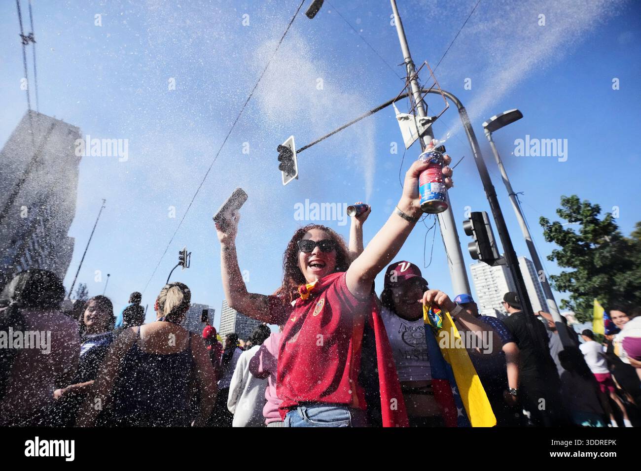 Venezuelans celebrate after U.S. President Donald Trump announced that ...