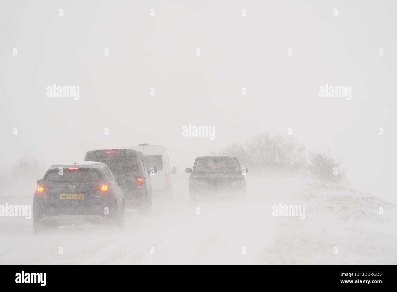 Traffic on the A171 between Whitby and Scarborough in a snow blizzard ...