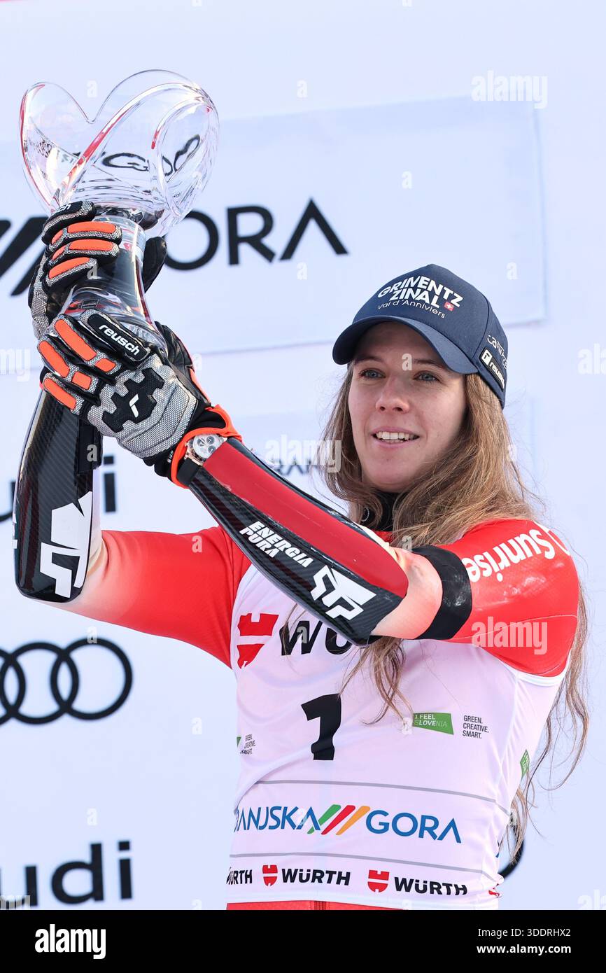 Switzerland's Camille Rast celebrates on podium after winning an alpine ...