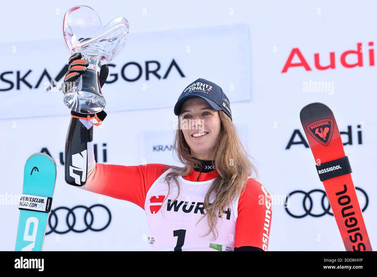 Switzerland's Camille Rast celebrates on podium after winning an alpine ...