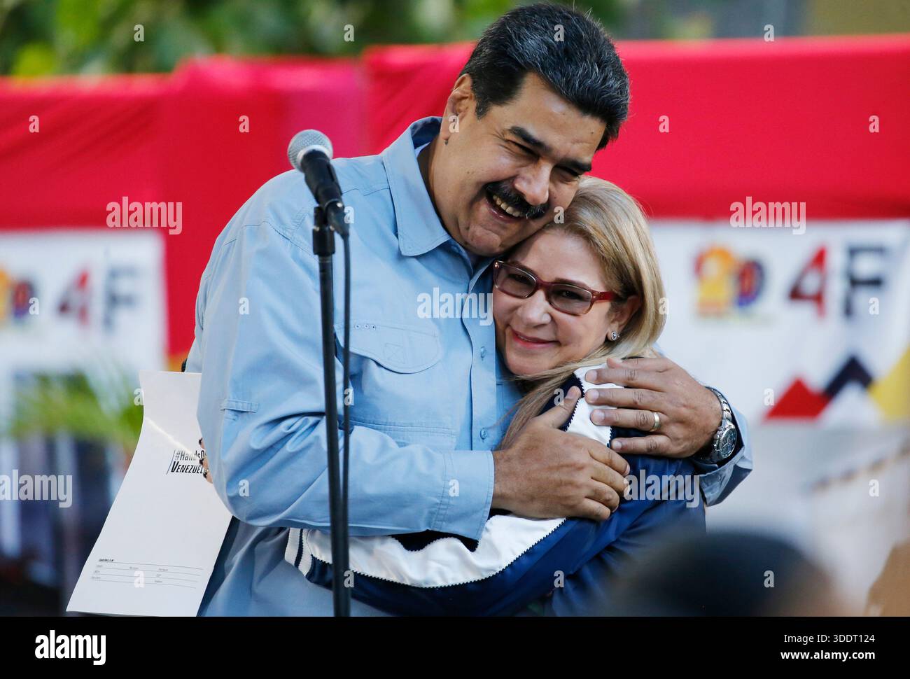 FILE - Venezuela's President Nicolas Maduro hugs first lady Cilia ...