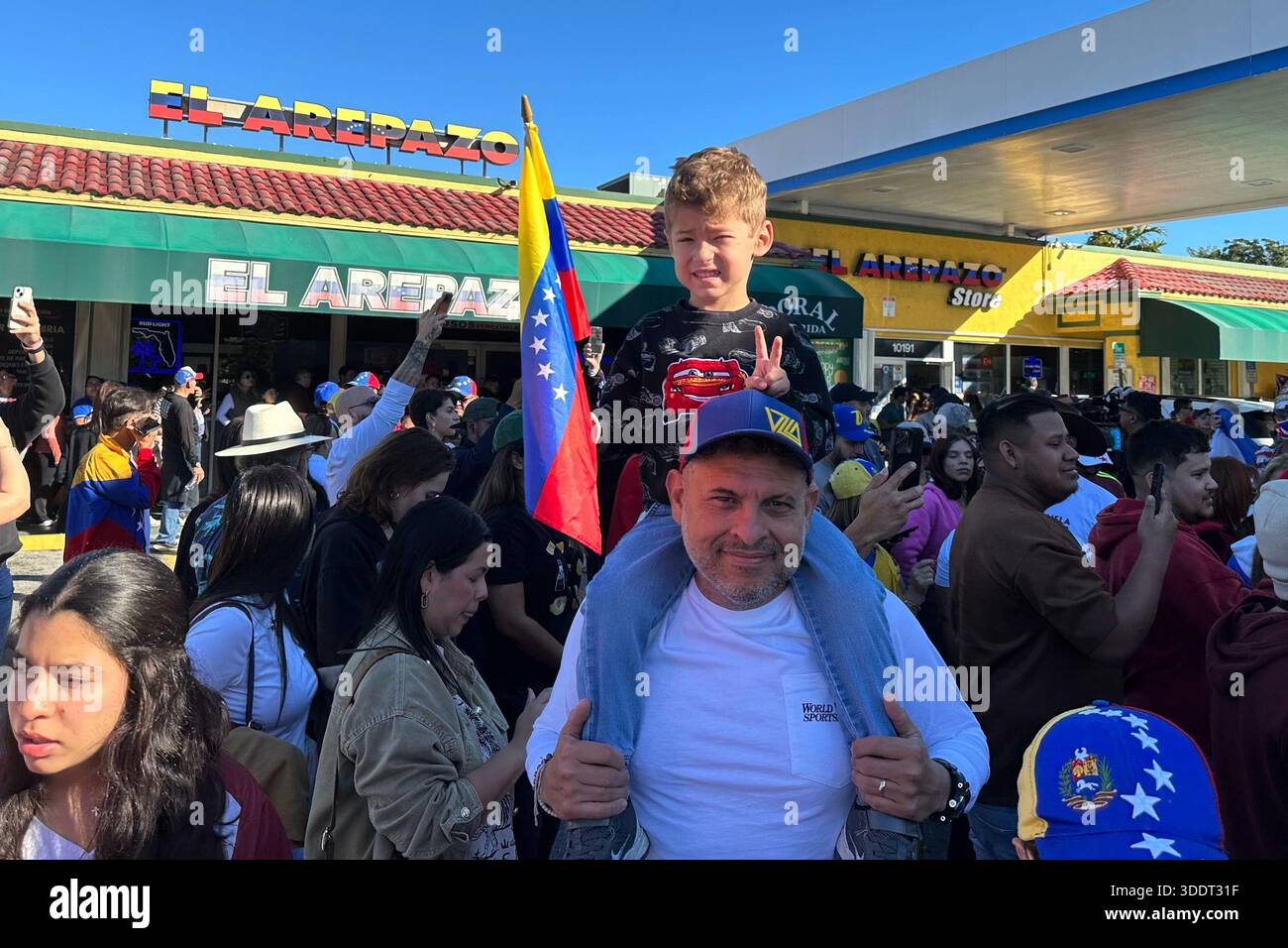 Lorenzo Coppola, 47, and his son Valentino join others to celebrate the ...