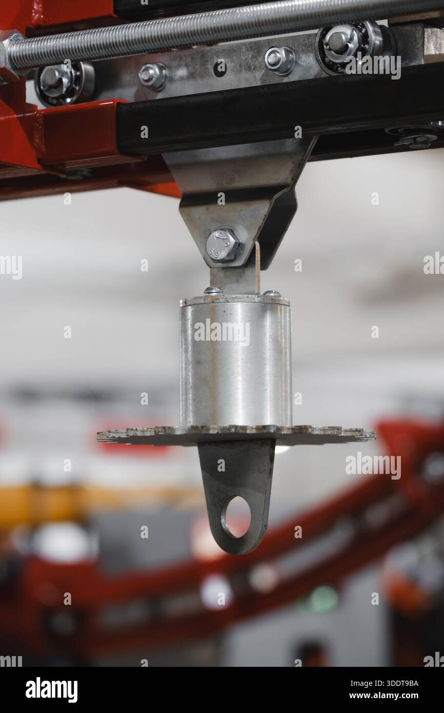 Suspension trolley unit on linear guide with rollers, featuring ...