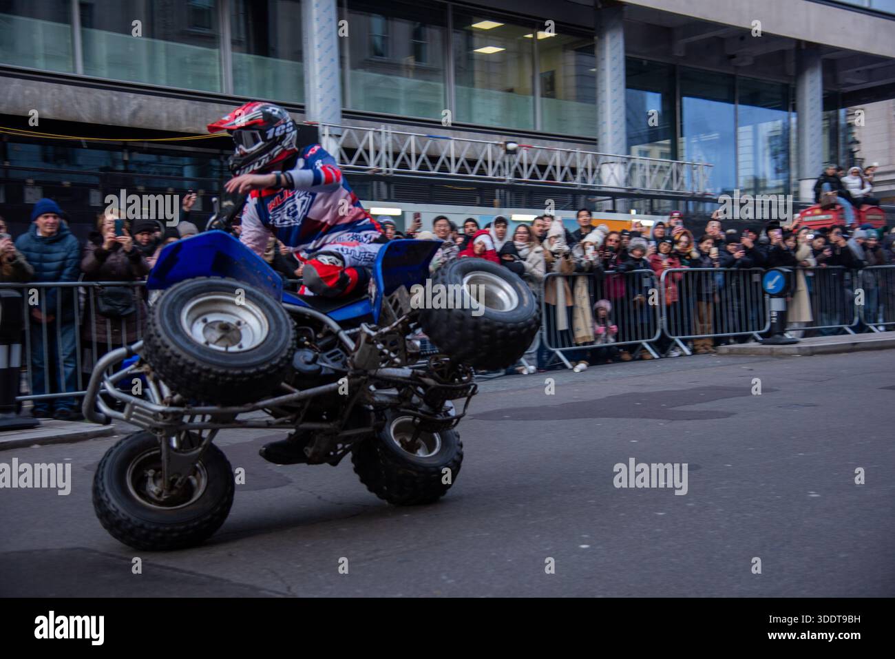 Stunt performers entertain fans during the London New Year’s Day Parade ...