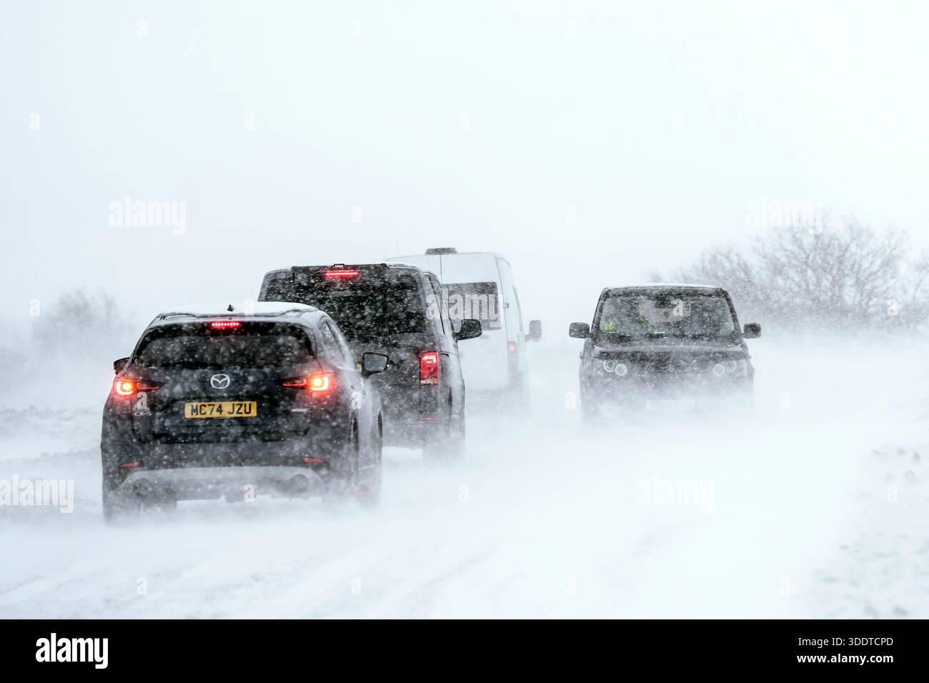 Traffic on the A171 between Whitby and Scarborough in a snow blizzard ...