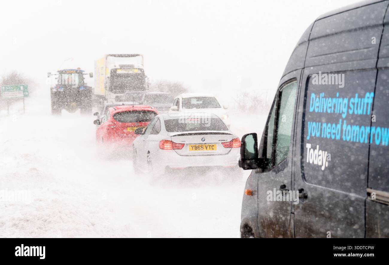 Traffic on the A171 between Whitby and Scarborough in a snow blizzard ...