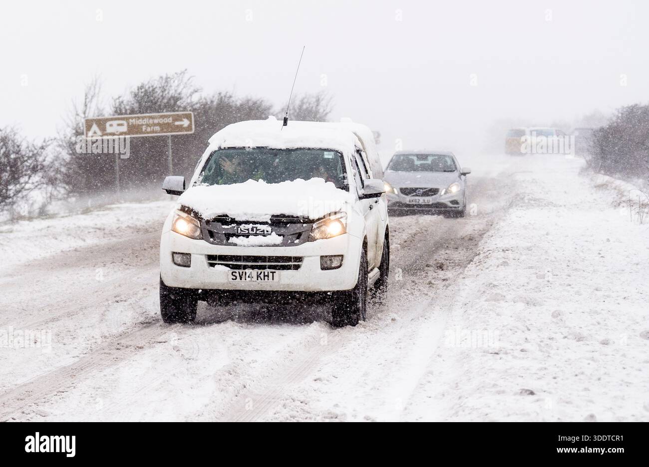 Traffic on the A171 between Whitby and Scarborough in a snow blizzard ...
