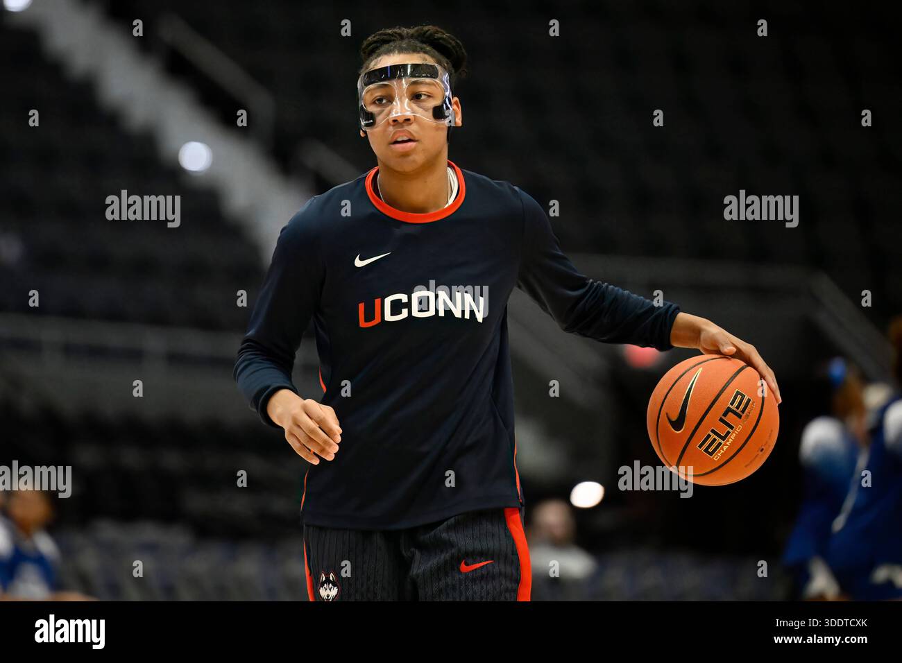 UConn guard KK Arnold warms up before an NCAA college basketball game ...