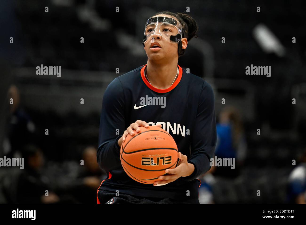 UConn guard KK Arnold (2) warms up before an NCAA college basketball ...
