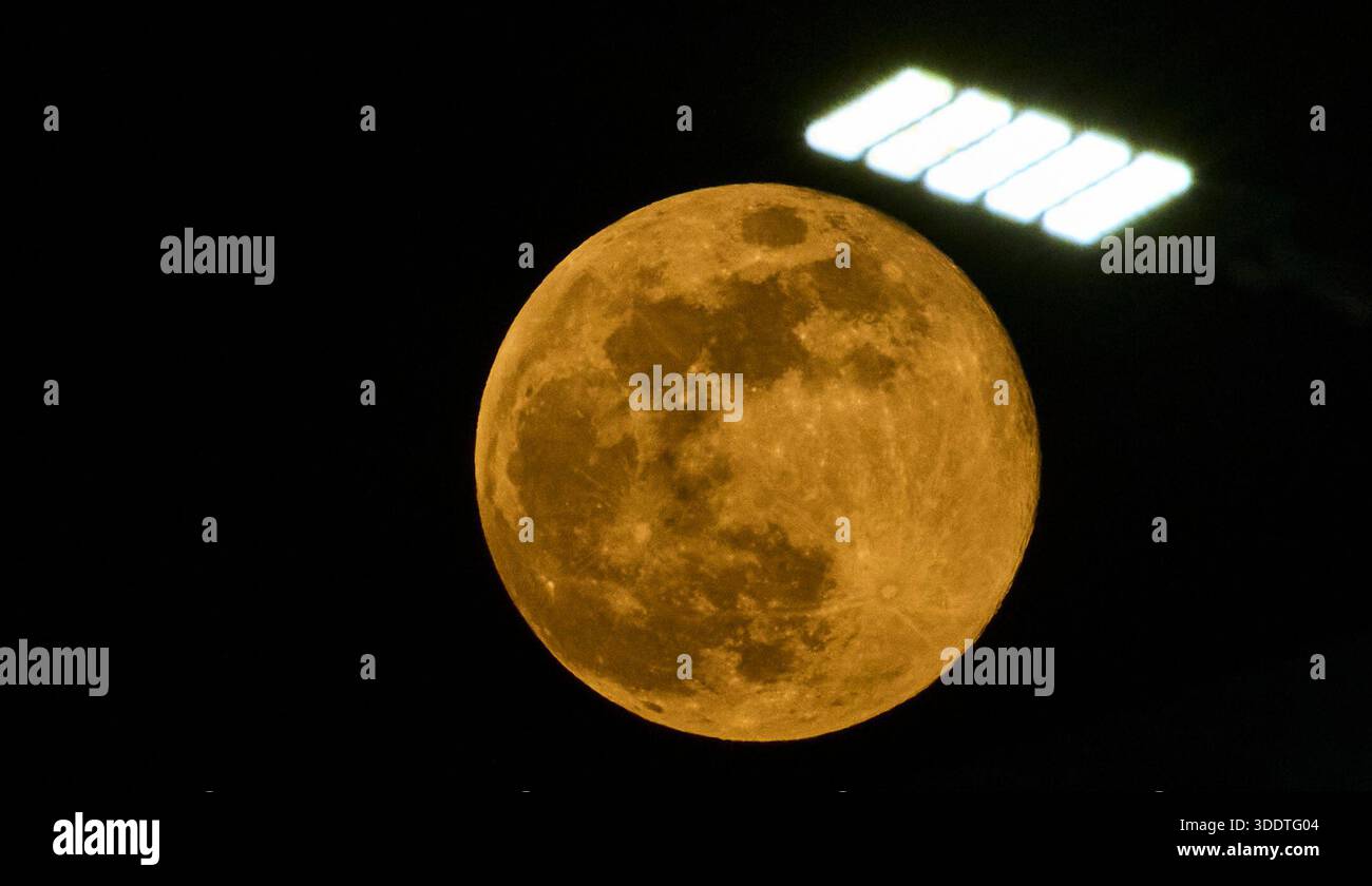 The full moon, known as the Wolf Supermoon, rises above Baghdad, Iraq ...