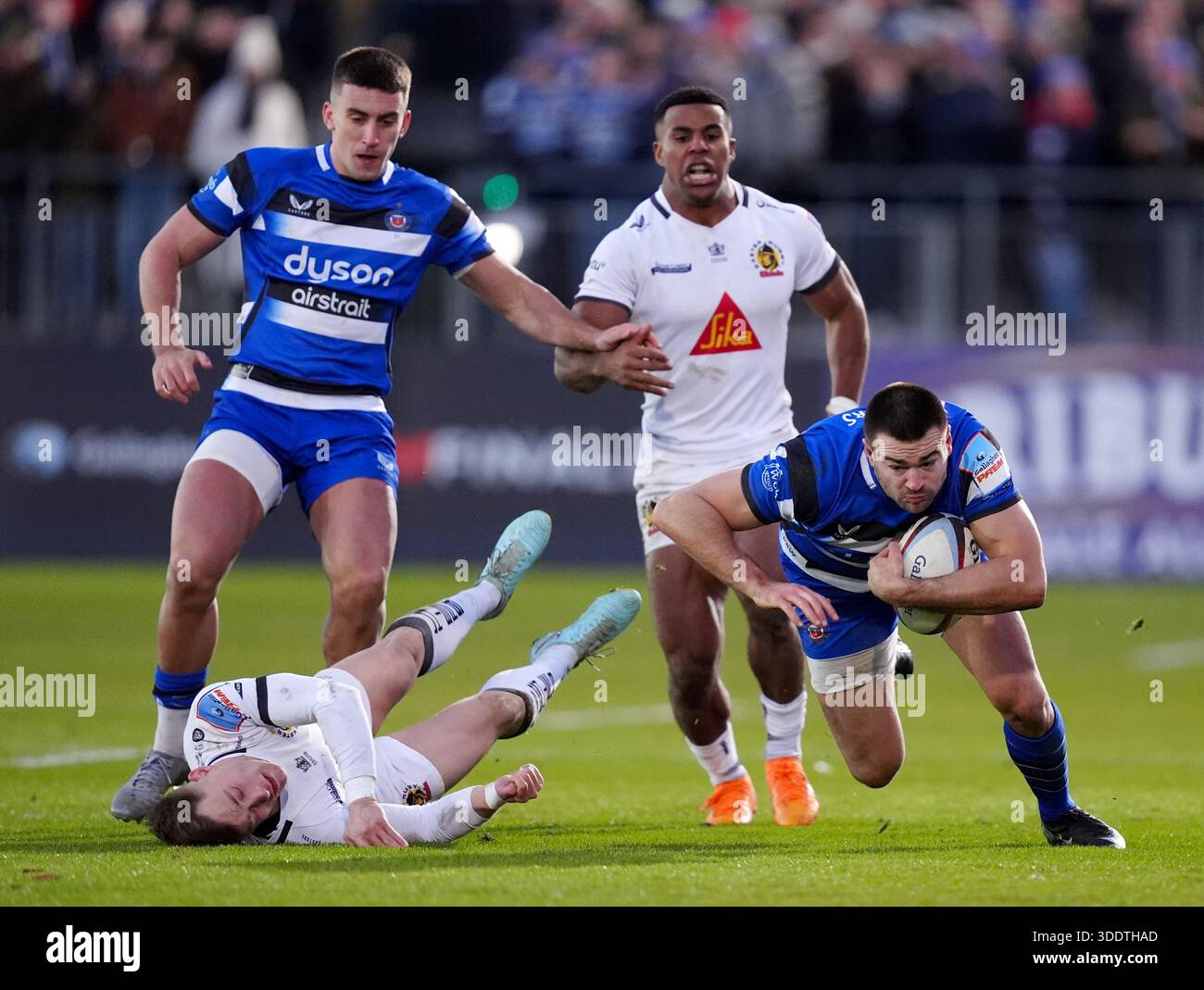 Bath Rugby's Will Muir is tackled by Exeter Chiefs' Stephen Varney ...