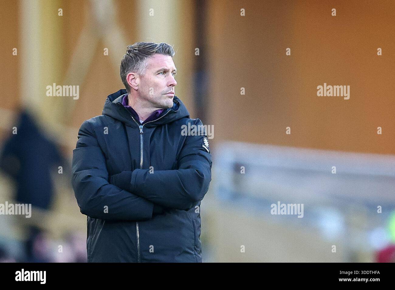 Rob Edwards, manager of Wolverhampton Wanderers watches the action ...