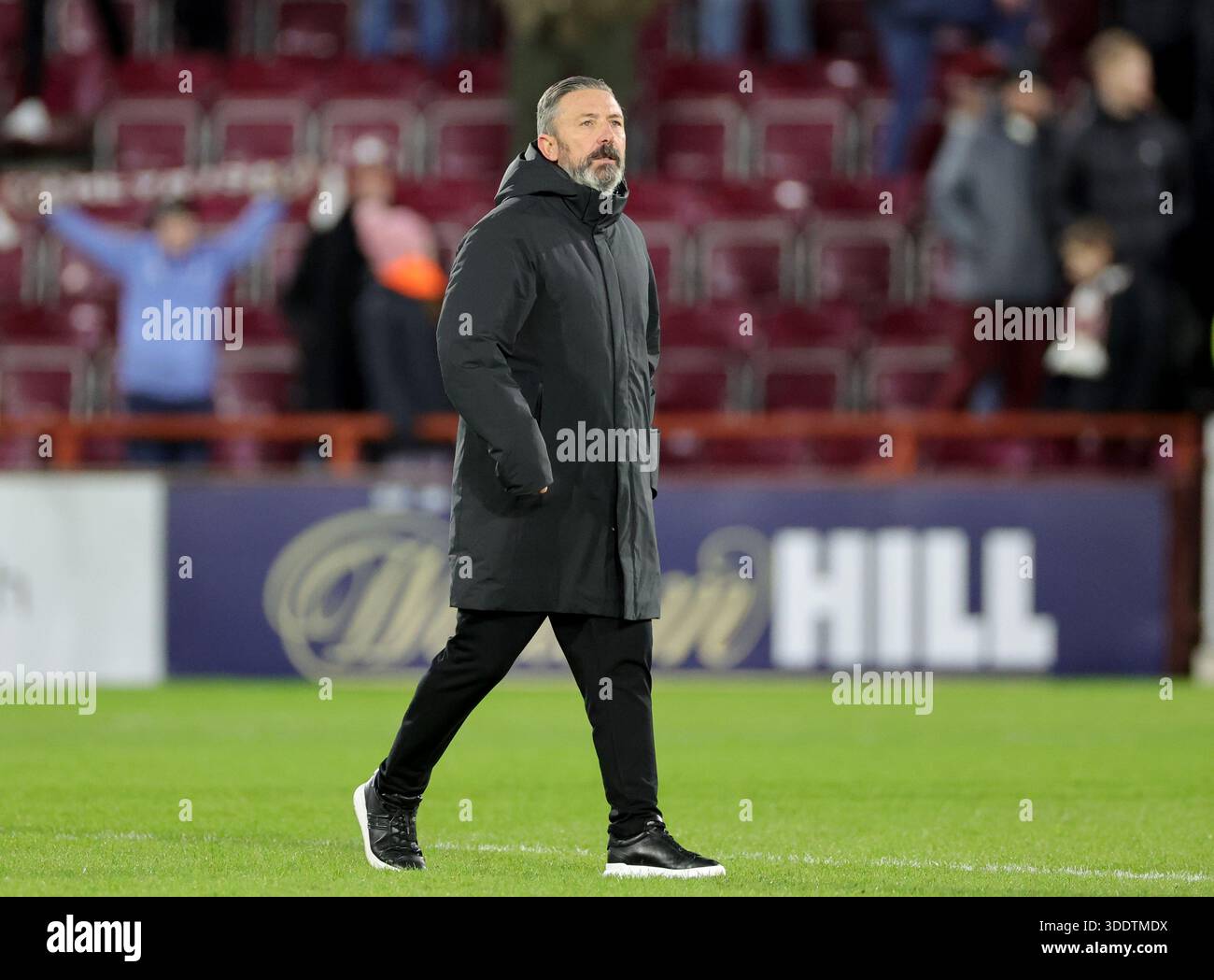 Heart of Midlothian manager Derek McInnes on the pitch after the ...