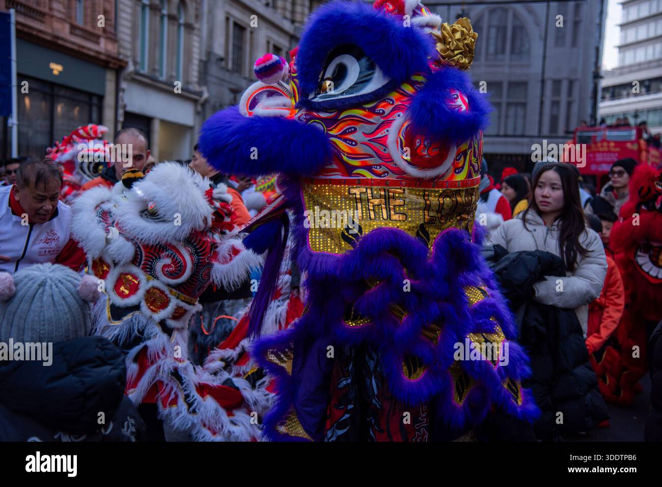 Asian performers entertain the crowd during the London New Year’s Day ...