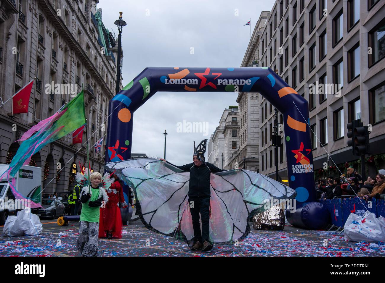 Performers dressed in elaborate costumes entertain fans during the ...