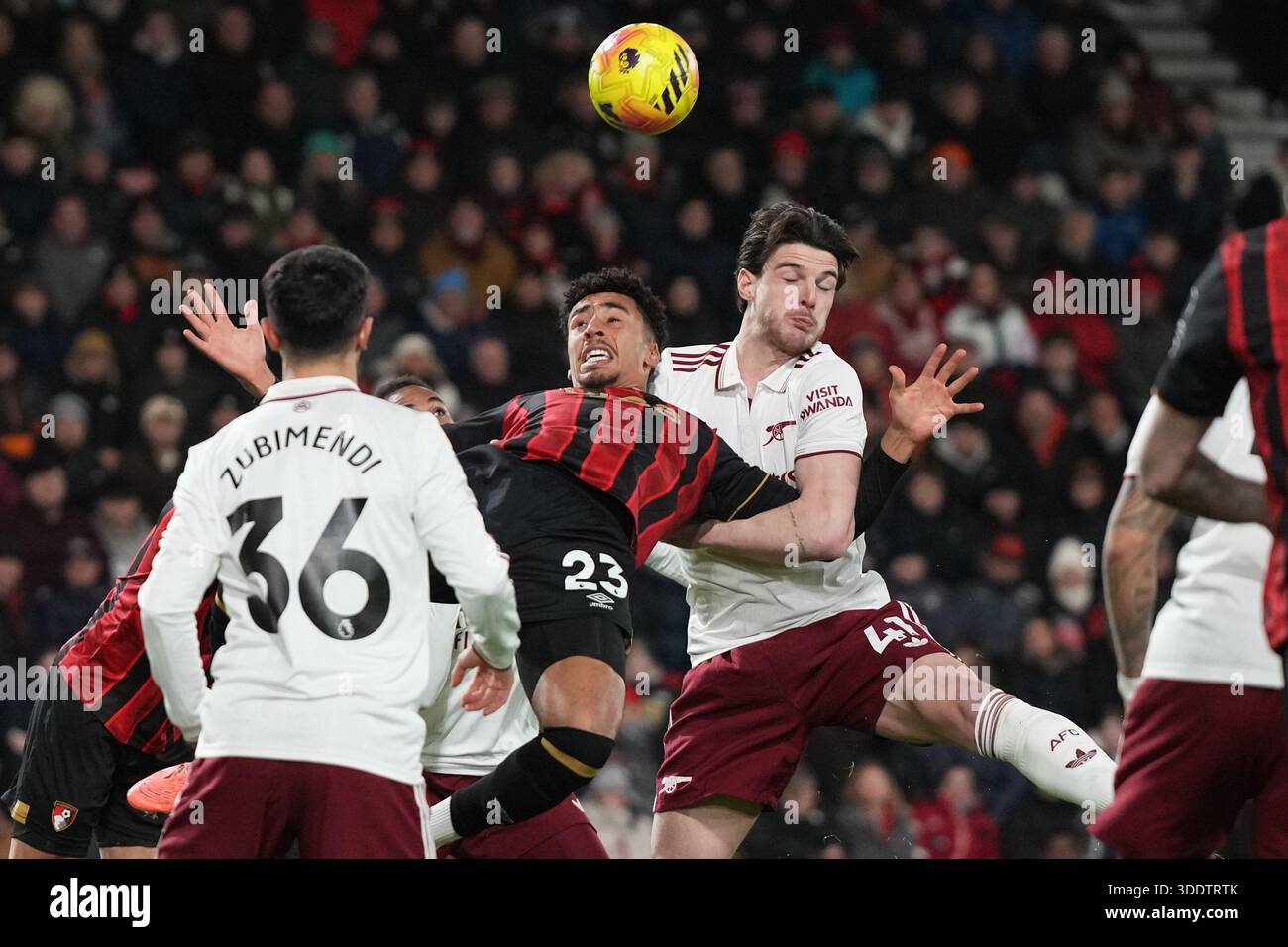 Arsenal's Declan Rice, right, challenges Bournemouth's James Hill ...