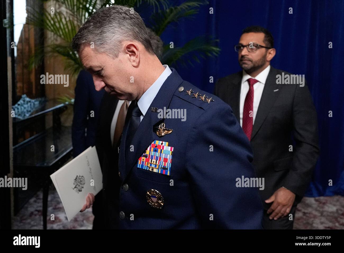 Chairman of the Joint Chiefs of Staff Gen. Dan Caine and FBI director ...