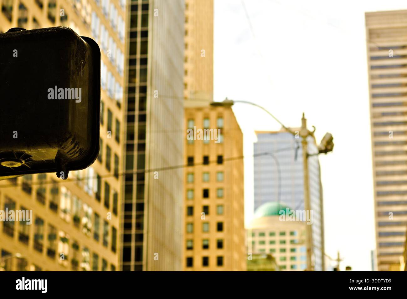Downtown Seattle street view framed by tall office towers, power lines ...