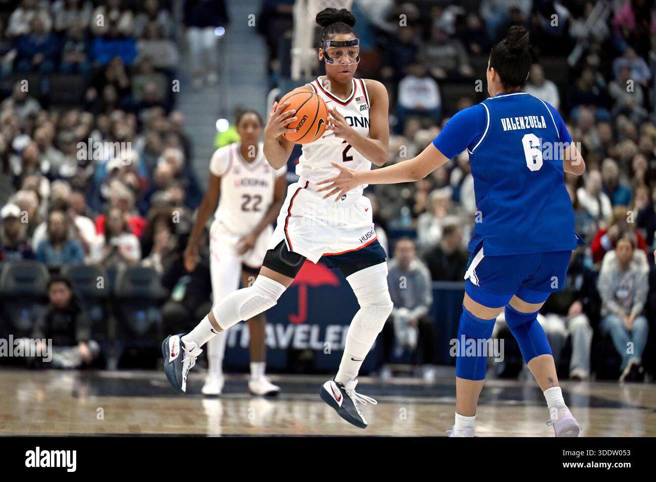 UConn guard KK Arnold (2) grabs a pass intended for Seton Hall forward ...
