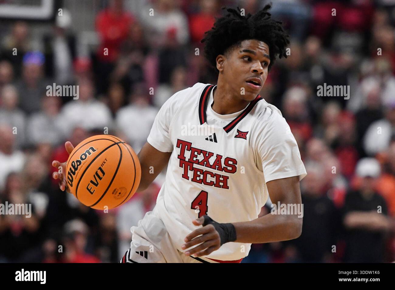 Texas Tech guard Christian Anderson (4) dribbles the ball during the ...