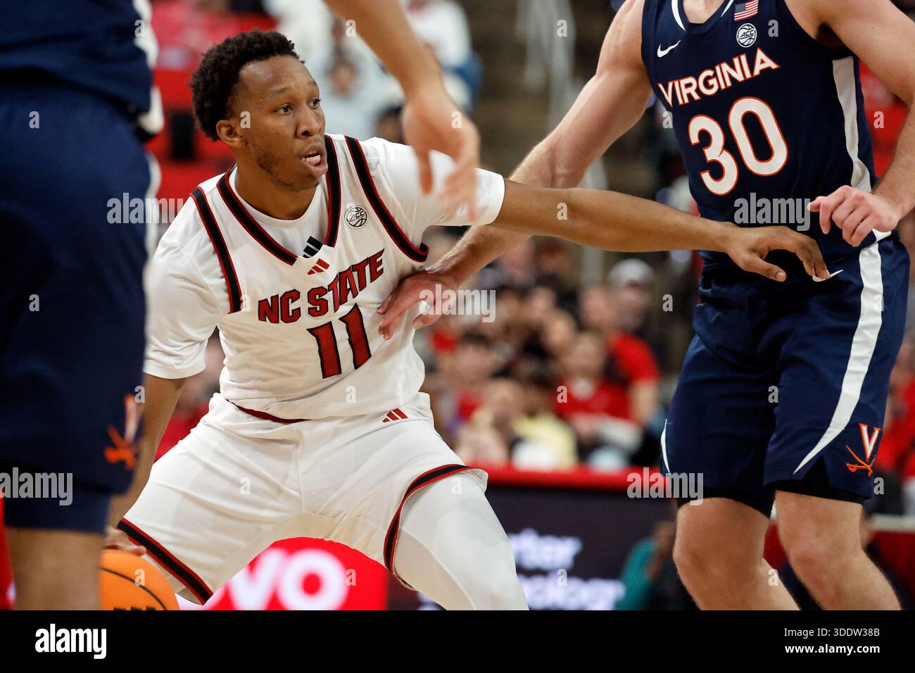North Carolina State's Quadir Copeland (11) looks to pass the ball with ...