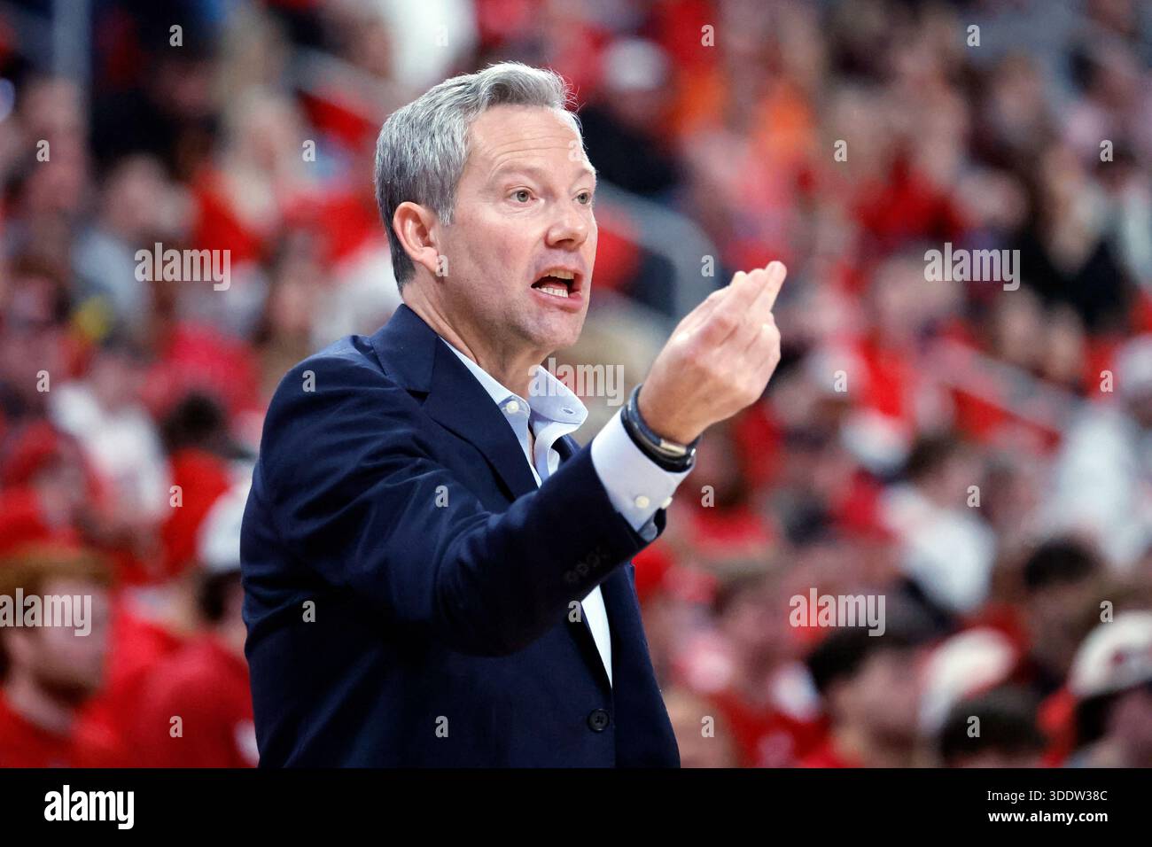 Virginia head coach Ryan Odom coaches from the sideline during the ...