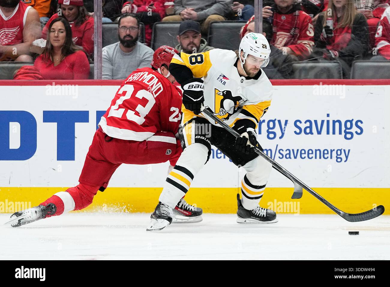 Pittsburgh Penguins defenseman Parker Wotherspoon, right, moves the ...