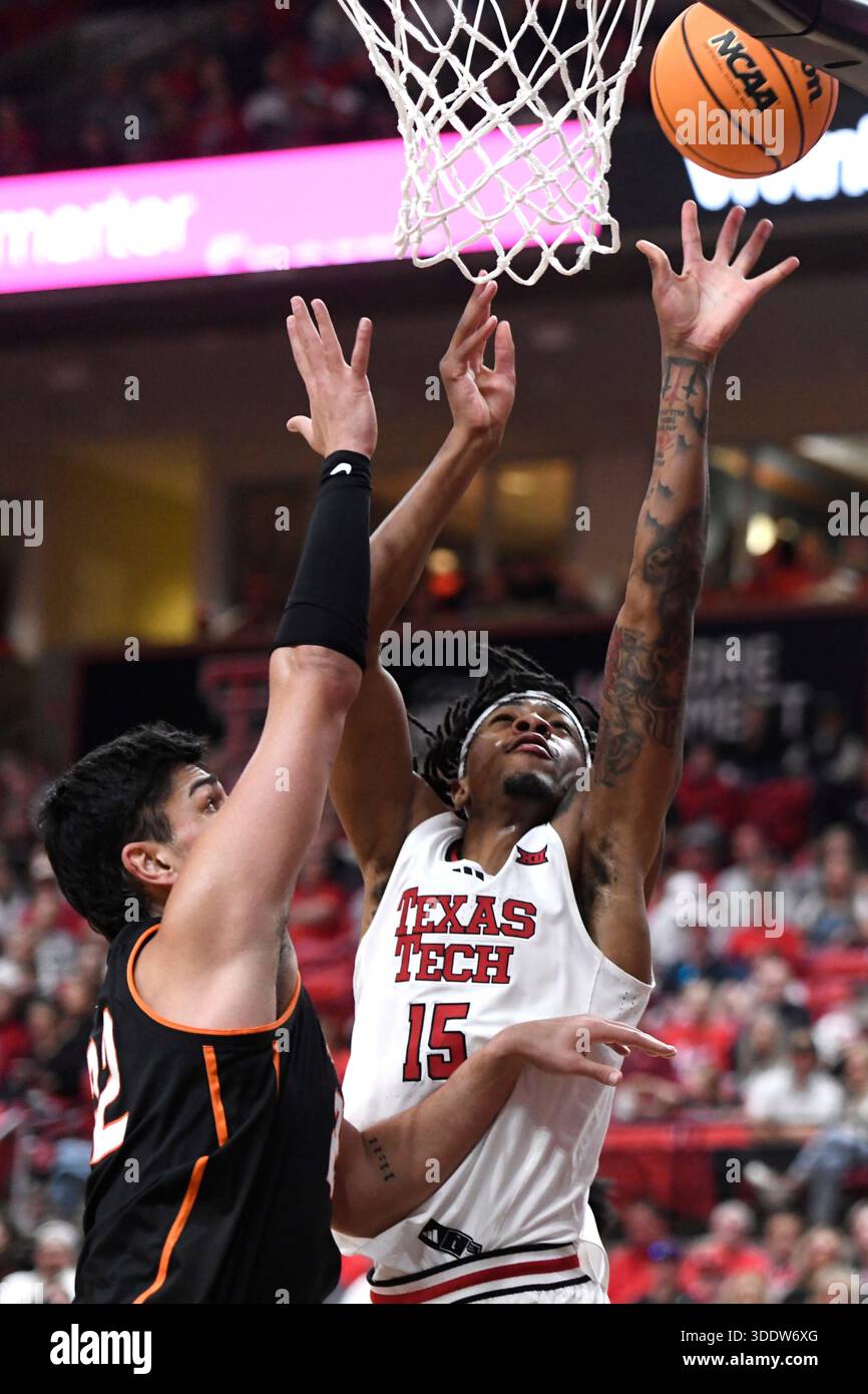 Texas Tech forward JT Toppin (15) goes for a layup while Oklahoma State ...