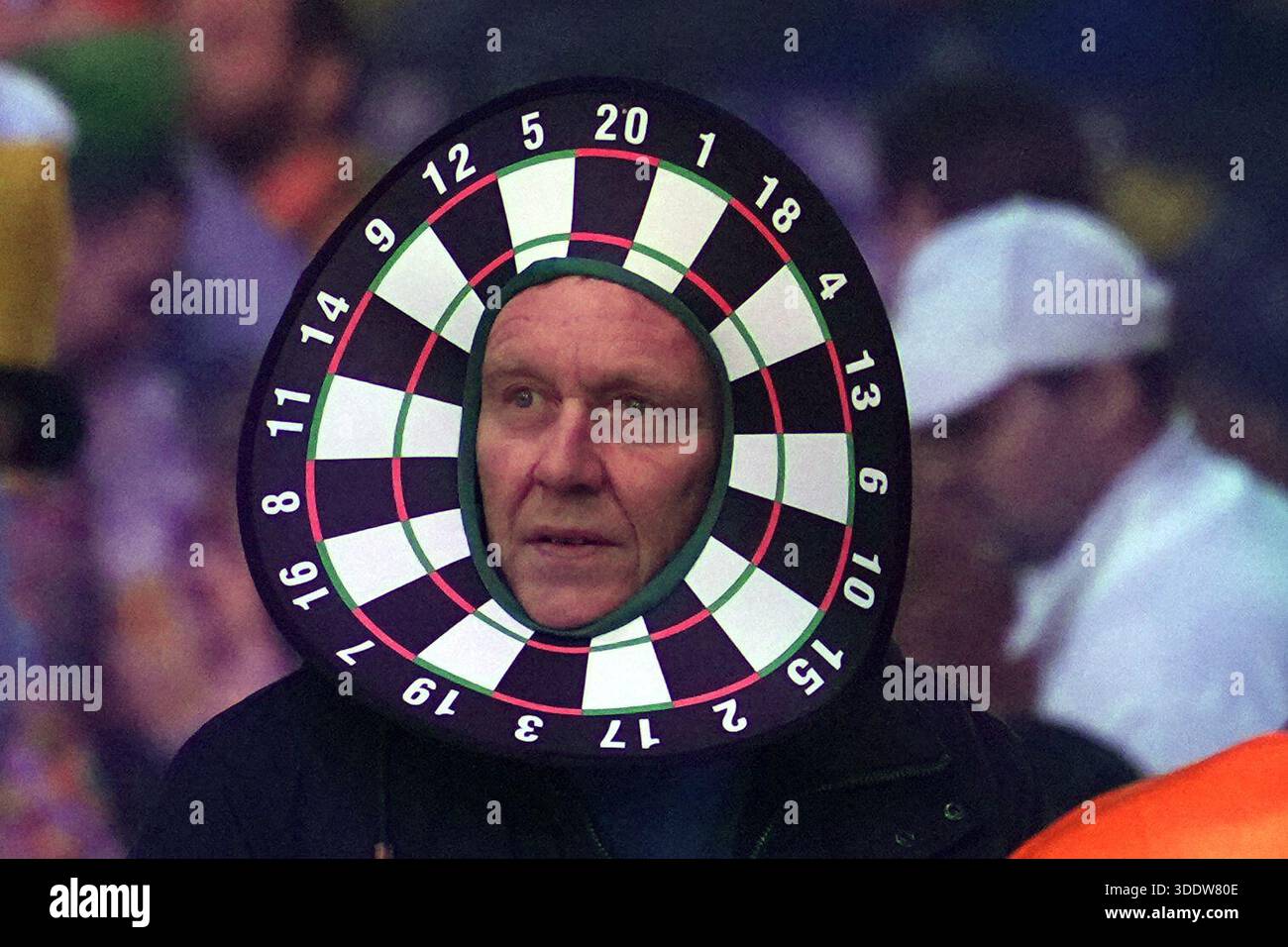 A darts supporter awaits the start of the World Darts Championships ...