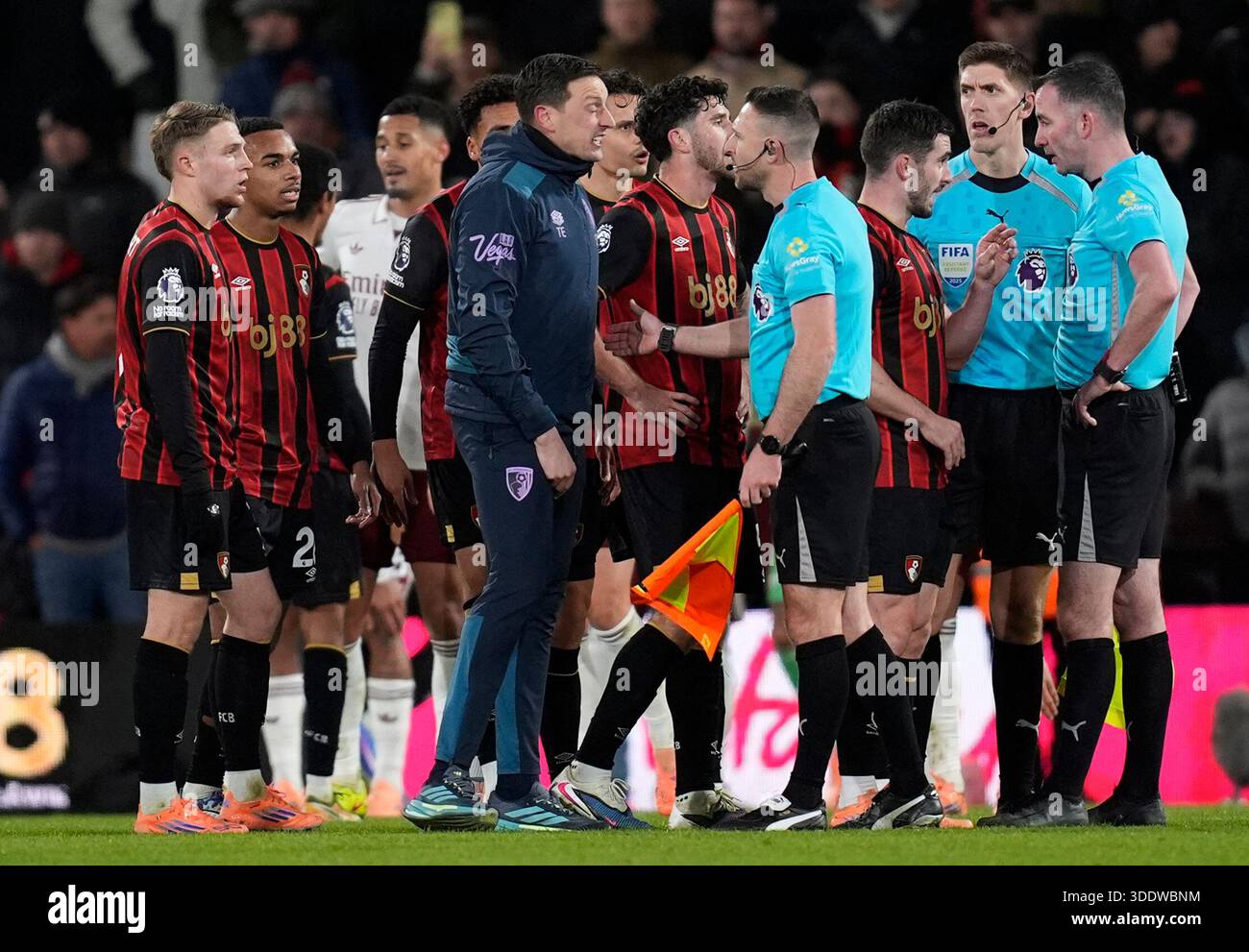 Bournemouth assistant manager Tommy Elphick speaks with referee Chris ...
