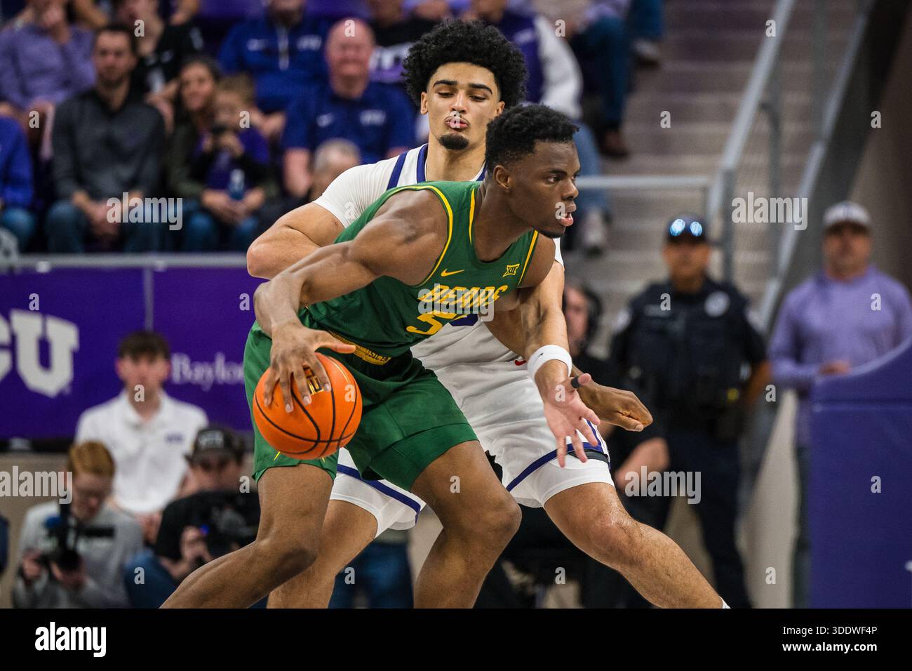 Baylor center James Nnaji (50) moves the ball during an NCAA college ...