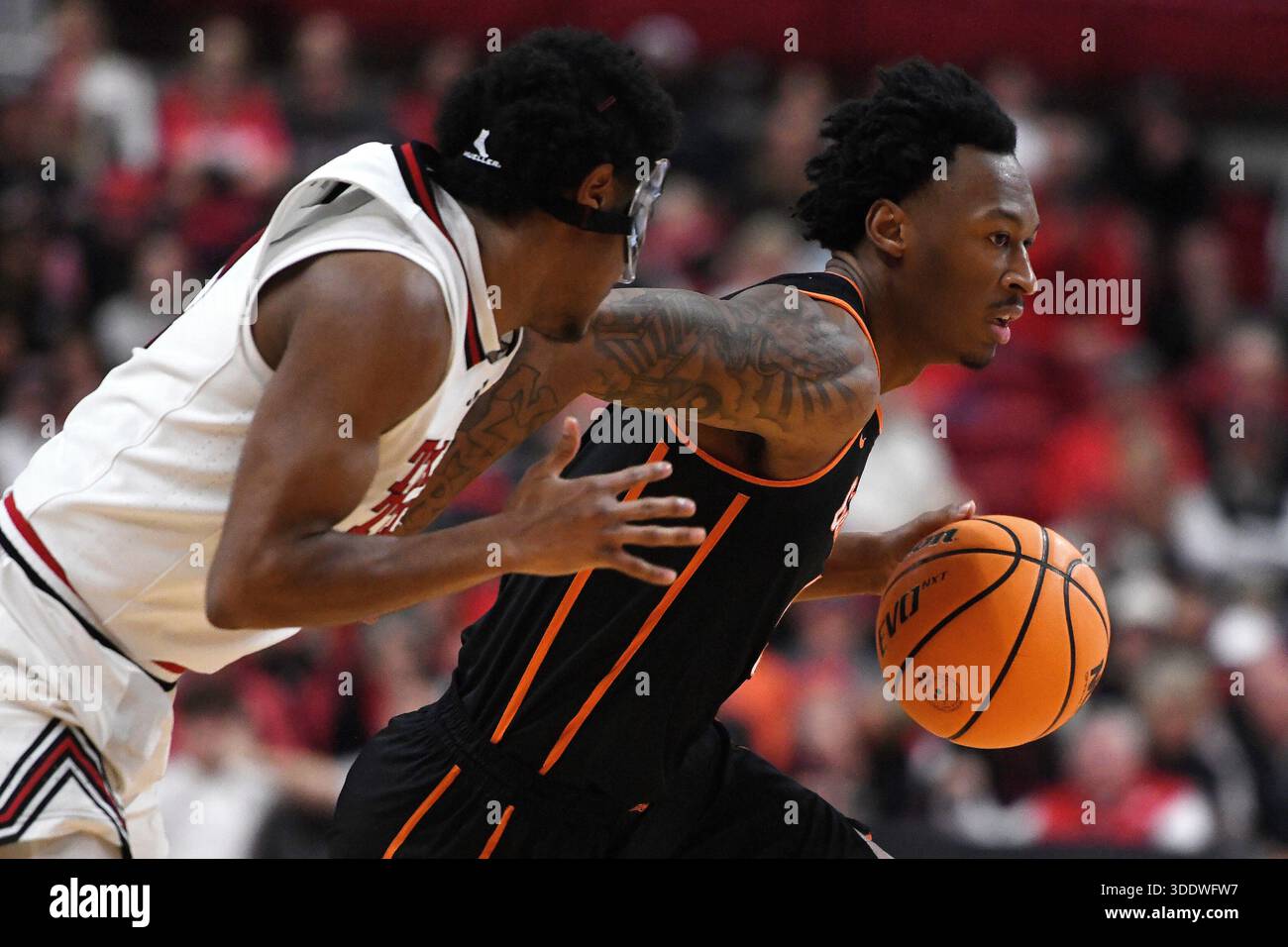 Texas Tech guard Jaylen Petty (11) attempts to guard Oklahoma State ...