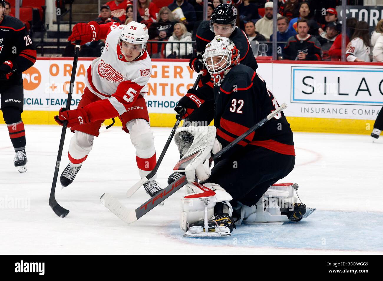 Detroit Red Wings' Emmitt Finnie (58) calls for the puck in front of ...