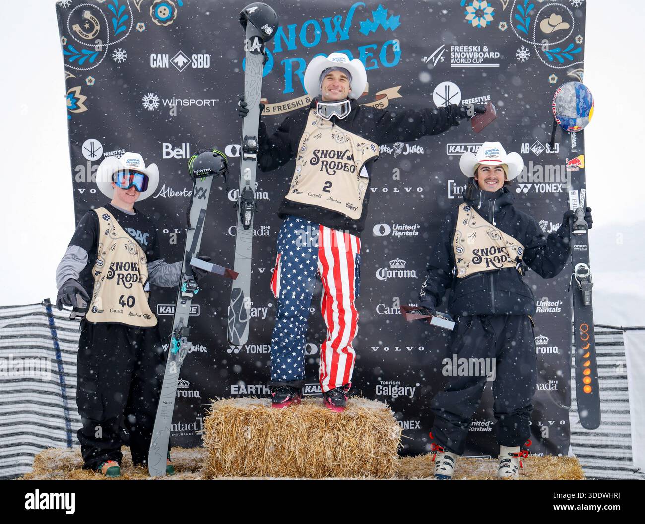 Nick Goepper, centre, of the United States, celebrates his victory on ...