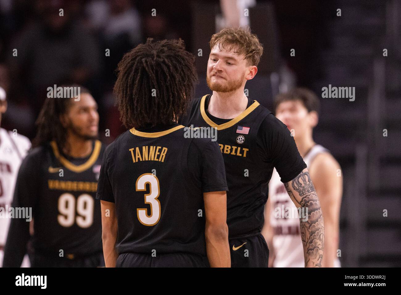 Vanderbilt forward Tyler Nickel (5) celebrates with guard Tyler Tanner ...