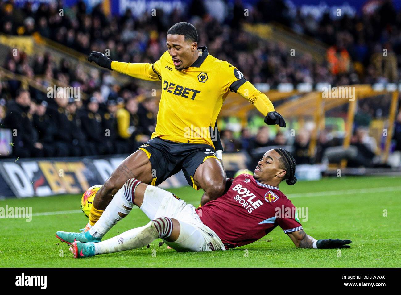 Crysencio Summerville (7 West Ham) tackles Jackson Tchatchoua (38 ...