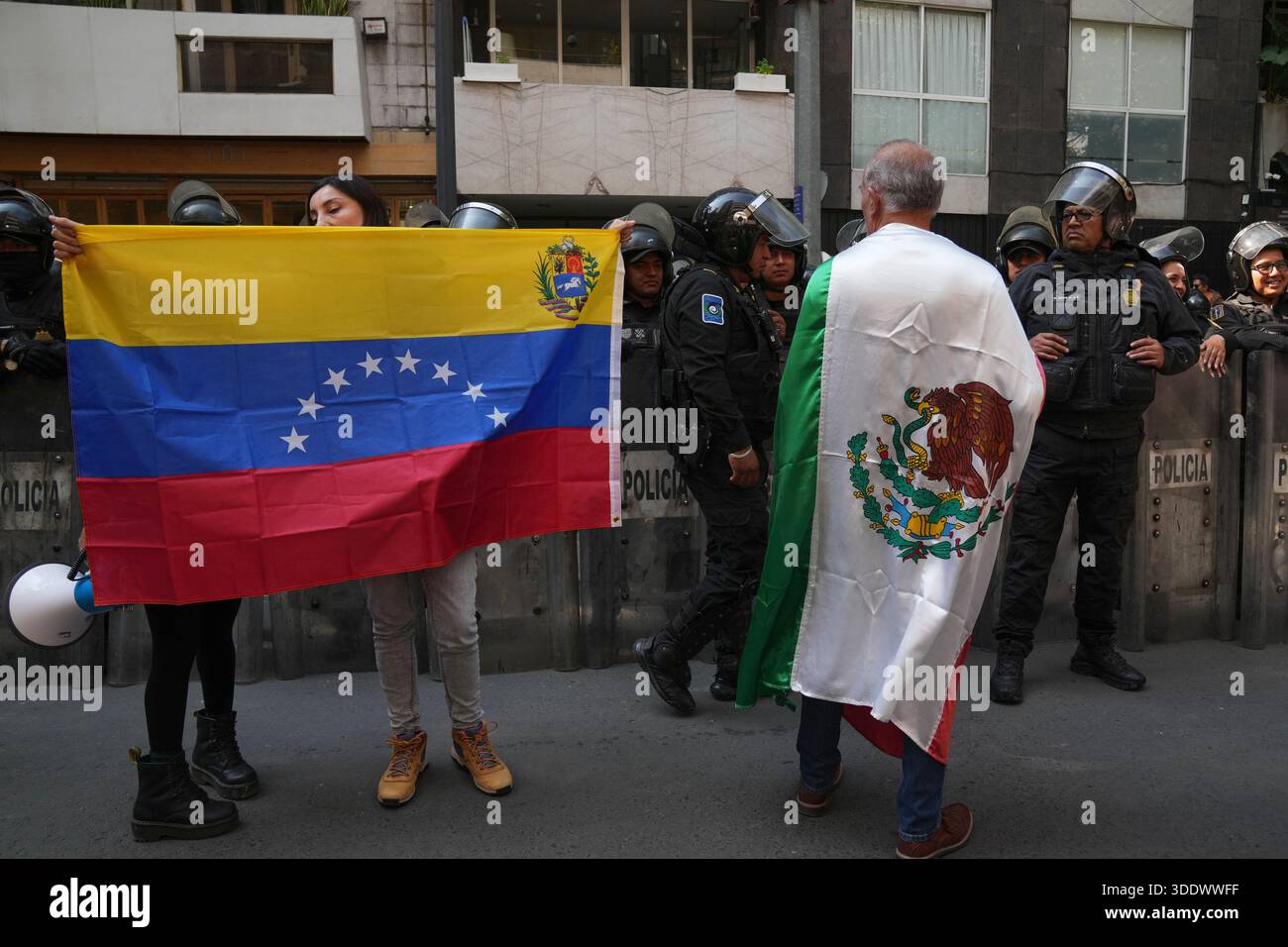 People gather outside Venezuela's Embassy to protest against the U.S ...