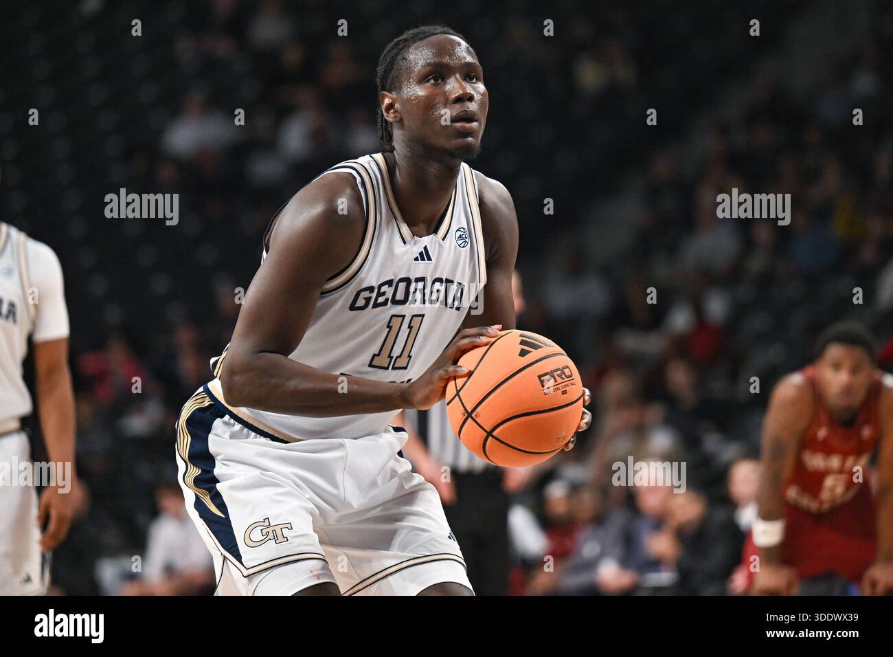 ATLANTA, GA - JANUARY 03: Georgia Tech forward Baye Ndongo (11) shoots ...
