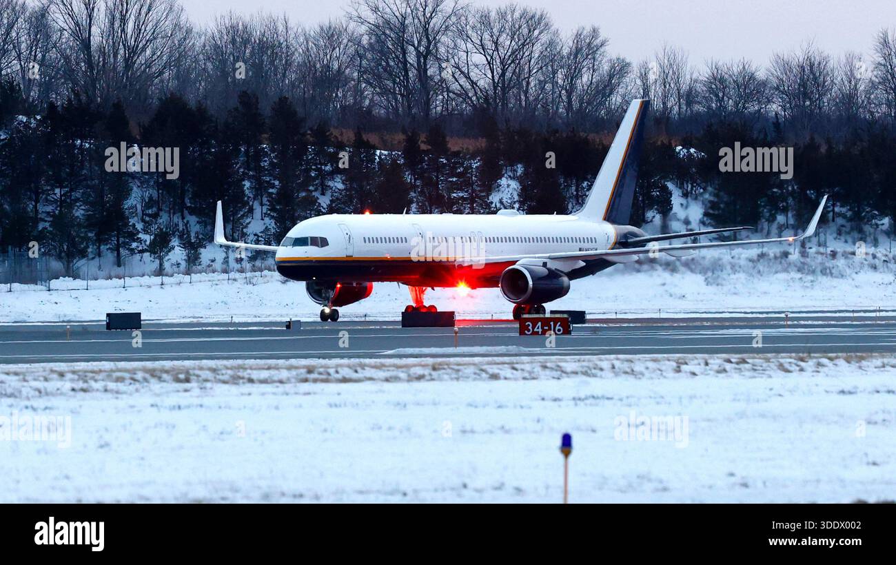 An airplane carrying captured Venezuelan President Nicolas Maduro lands ...