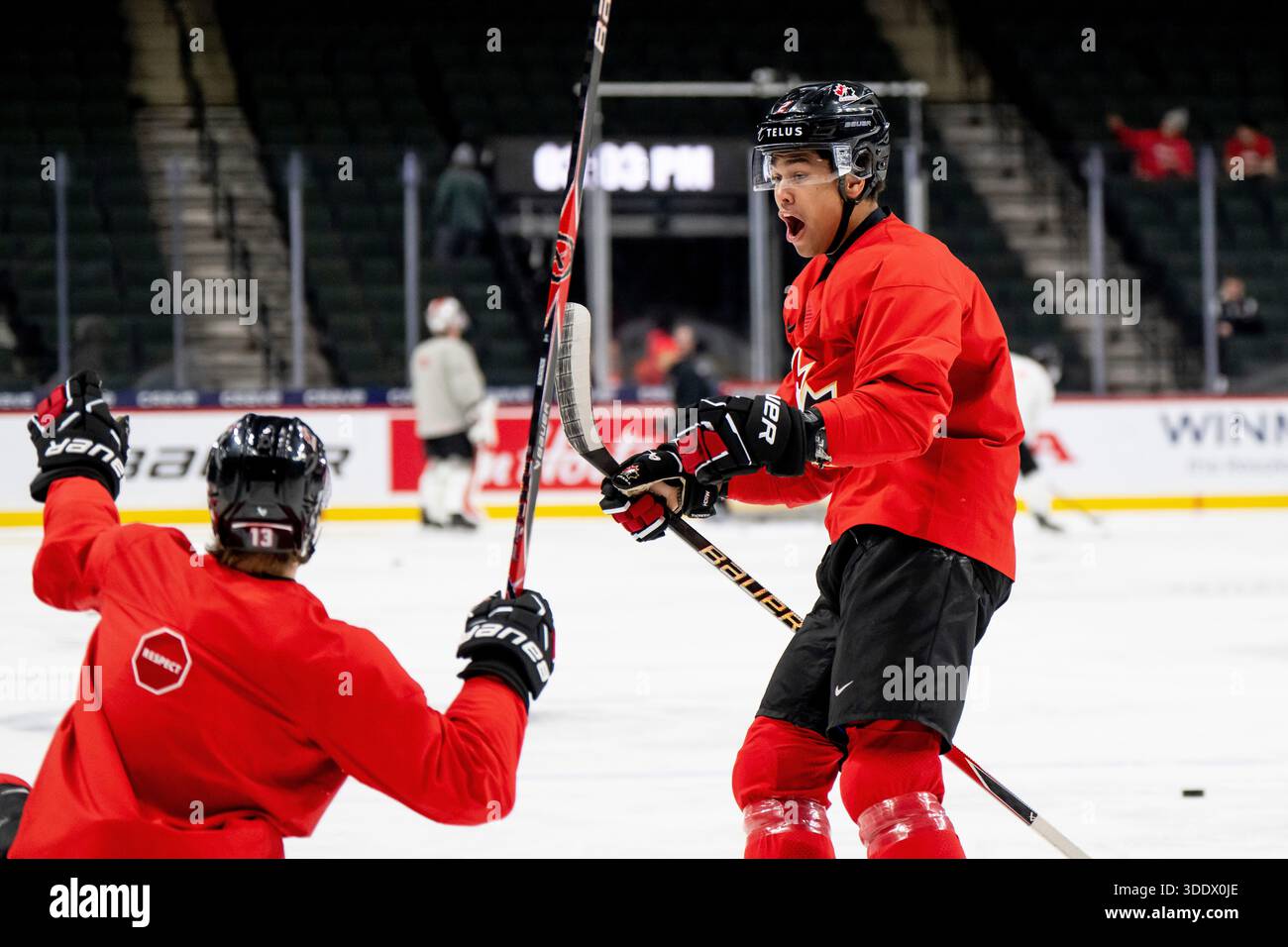 Canada's Kashawn Aitcheson (2) celebrates with teammate Ethan MacKenzie ...
